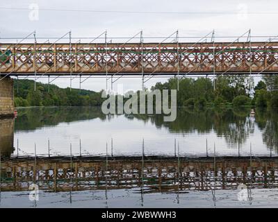 Scaffolding used for maintenance or restoration work on a small bridge ...