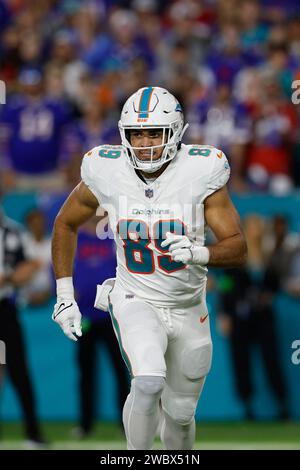 Miami Dolphins tight end Julian Hill (89) is tackled by Carolina ...