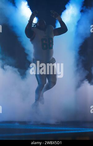 Miami Dolphins offensive lineman Robert Jones (65) walks on the ...