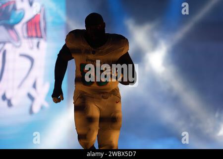 Miami Dolphins offensive lineman Robert Jones (65) walks on the ...