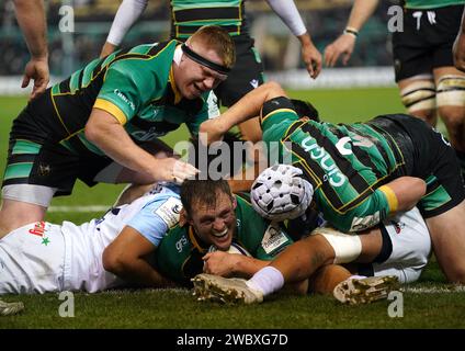 Northampton Saints' Alex Waller celebrates scoring their side's seventh ...