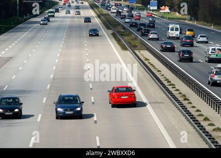 Driver in red BMW driving wrong direction digital composing Germany ...
