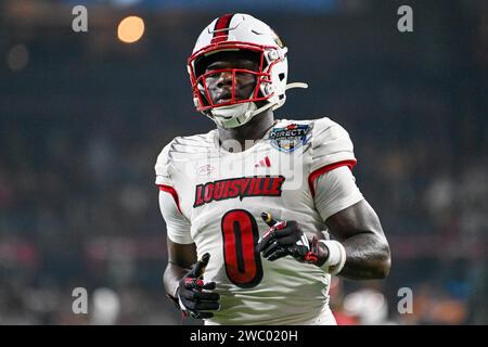 Louisville wide receiver Chris Bell (0) runs with the ball to score a ...