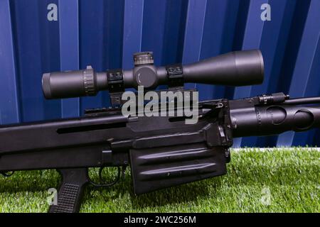 A fragment of an optical sight on a sniper rifle. Weapon shown for ...