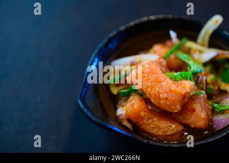 Spicy salmon salad in thai style food, stock photo Stock Photo - Alamy