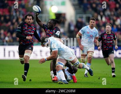 Vodacom Bulls' Marcell Coetzee is tackled by Northampton Saints' Henry ...