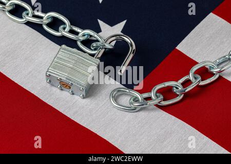 United States flag with unlocked chain. Border security, immigration ...