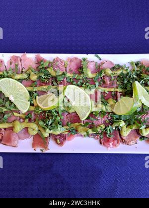 Tuna tiradito is a dish of Peruvian origin that consists of raw fish ...