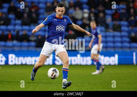 Josh Lundstram of Oldham Athletic Association Football Club tussles ...