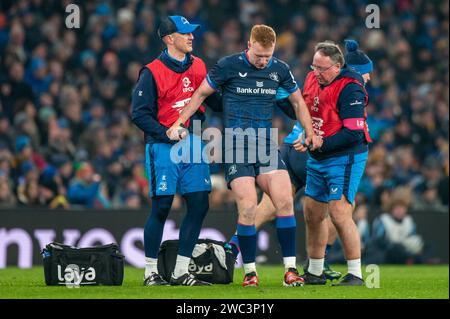 Ciaran Frawley of Leinster Rugby leaves the pitch injured during the ...
