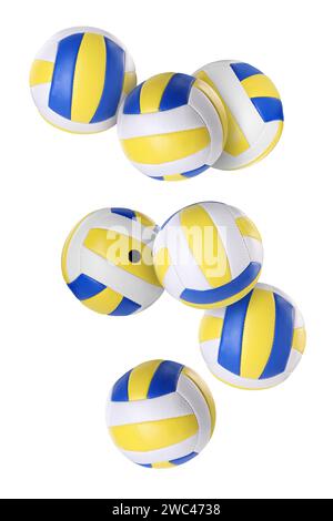 Many volleyball balls flying on white background Stock Photo - Alamy