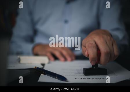 Authorized person rubber stamps contract certificates and office ...