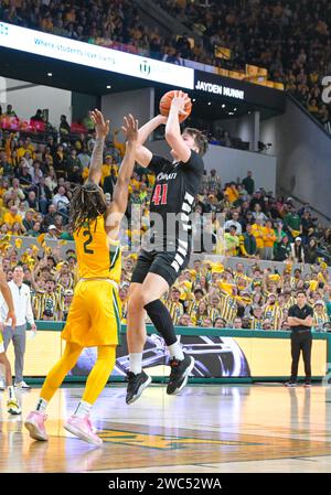 Cincinnati guard Simas Lukosius (41) shoots against Dayton forward Zed ...