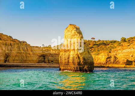 Beautiful limestone Algarve coast with caves and rock formation ...