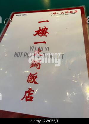 A close up of a menu at a Chinese restaurant on display in a ...