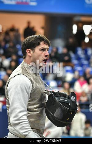France's foilist MAXIME PAUTY celebrates winning during the quarter ...