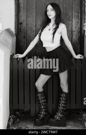 A grayscale shot of a goth girl in an urban setting Stock Photo - Alamy