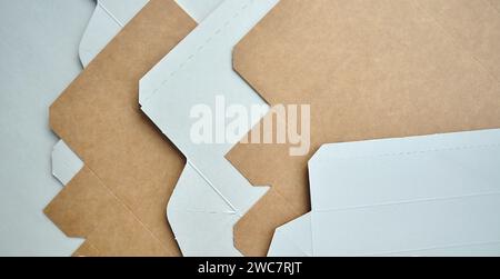 Artistic background of textured layers of unfolded cardboard boxes ...