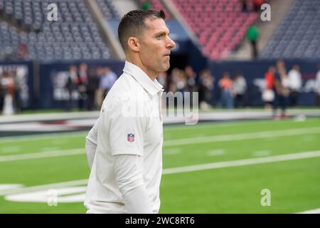 Houston Texans general manager Nick Caserio stands on a field during ...