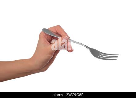 woman's hand holding fork to grab spaghetti and eat it. eating in the ...