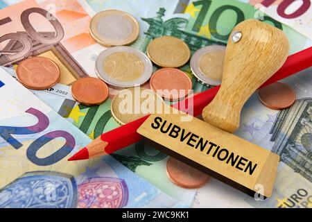 Euro banknotes and a stamp with the german word forr property tax, new ...