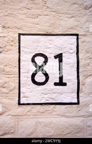 Sign with a number, 81 Stock Photo - Alamy