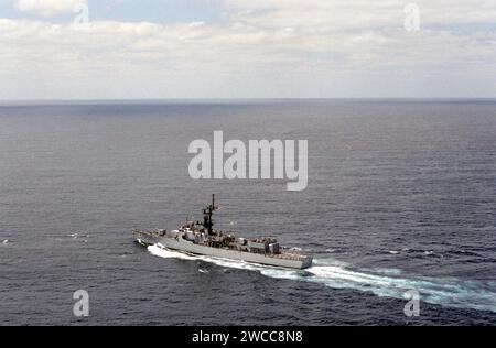 A port quarter view of the frigate USS DOWNES (FF 1070) underway ...