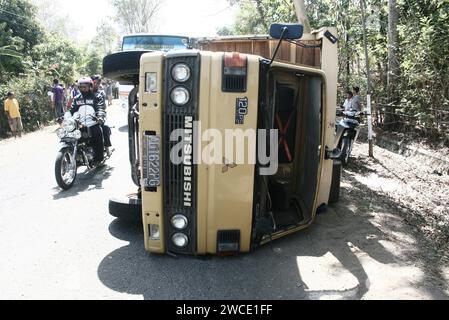 The truck overturned during an accident on a cross-city road in East ...