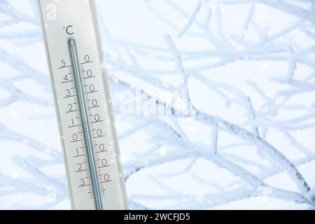 Thermometer showing temperature below zero outdoors on winter day Stock ...