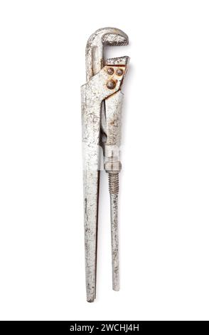 Vintage rusty pipe wrench on dark wooden background, symbolic of ...