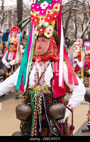Masked dancers from Central Bulgaria performing a ritual at the Surva ...