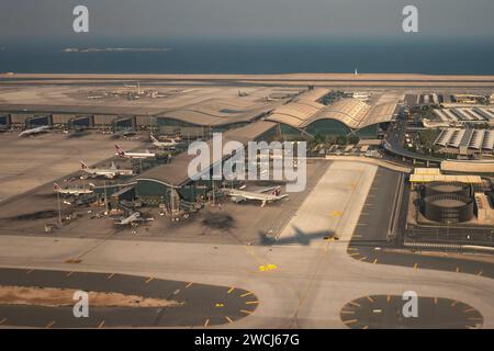 A commercial airplane takes off from Hamad International Airport in ...