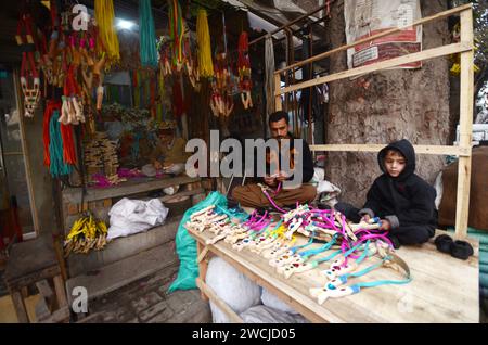 Peshawar, Pakistan. 16th Jan, 2024. A Pakistani man makes handmade ...