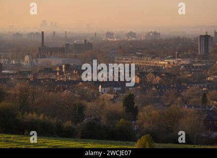 General view of factories and residential housing with the Manchester ...