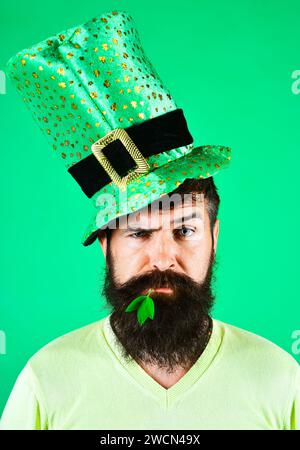 St. patrick's day sale, festive online shopping, young man in ...