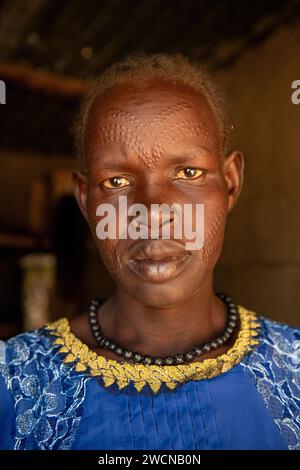 Uganda, Adjumani. A refugee woman in front of her house. Editorial use ...