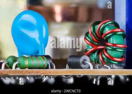 Green PCB detail. Electromagnetic coil and electronic surface-mount ...