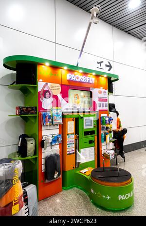 Luggage packaging stand. Baggage packing, luggage pack stand machine ...