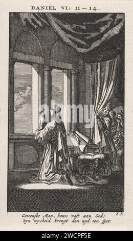 Daniel kneeling for a window is spied Stock Photo - Alamy