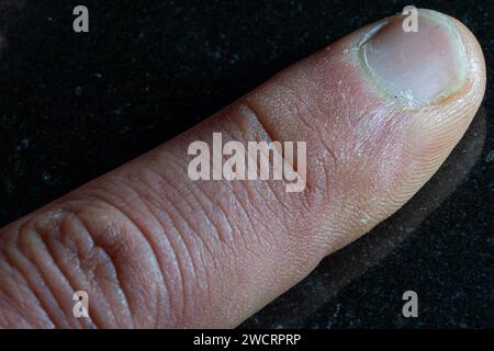 human hand index finger under smooth grey stone background Stock Photo ...
