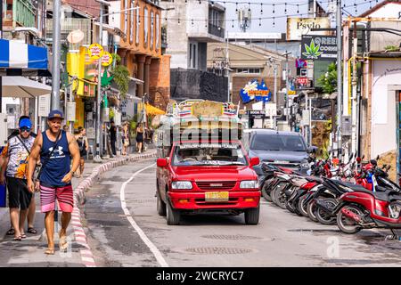 Songthaew taxi on Chaweng Beach Road, Ko Samui, Thailand Stock Photo ...