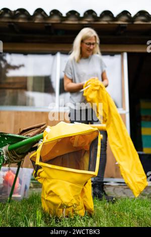 Beekeeper in full body uniform on white background Stock Photo - Alamy