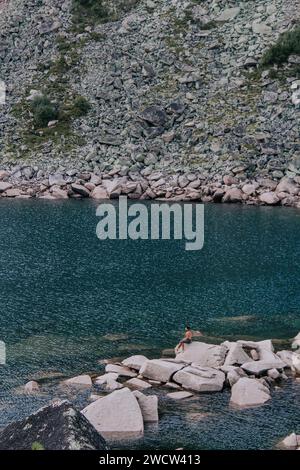 Large stones on the shore of the lake in autumn close up Stock Photo ...