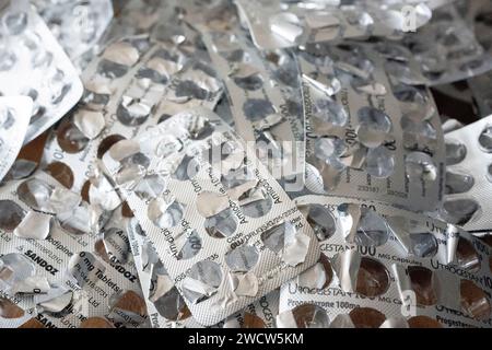 A detail of silver foils that once contained tablets, treatments and ...