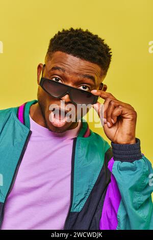 Photo of astonished impressed man trendy pullover get plastic bank card ...