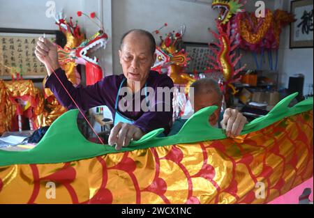 (240117) -- BINYANG, Jan. 17, 2024 (Xinhua) -- Craftsman Zou Yute makes ...