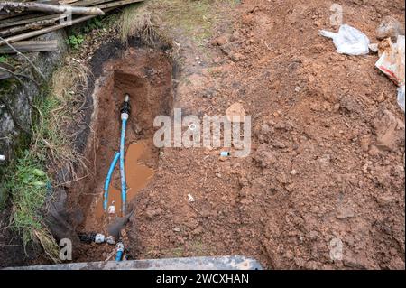 Repair to leaking branch pipe from mains water pipe by Welsh Water ...