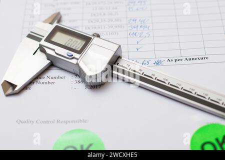 technician inspector using quality control tools in industry ...