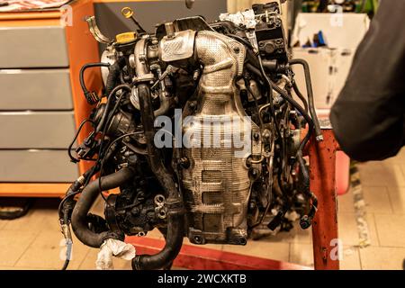 Close-up photo of a dismantled diesel engine's particulate filter ...