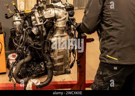 Close-up photo of a dismantled diesel engine's particulate filter ...